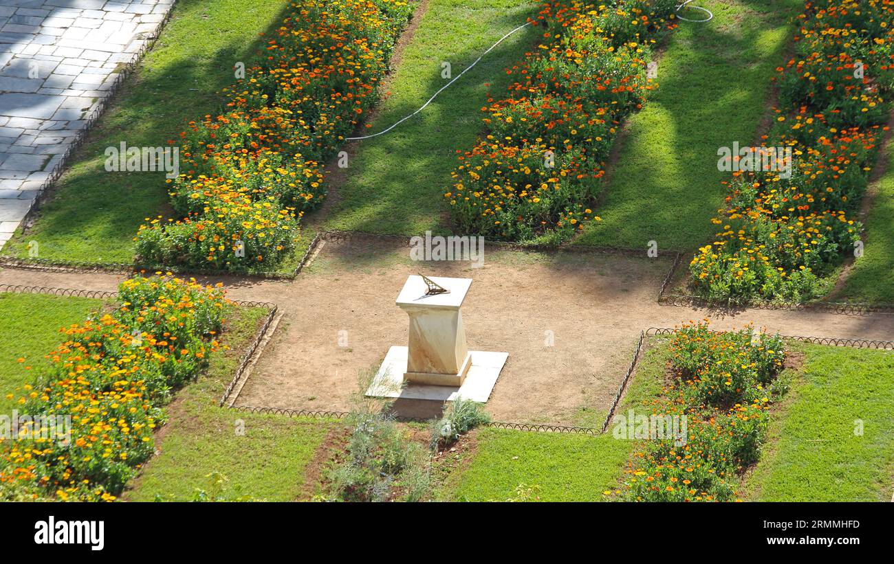 Sundial Clock at National Garden Park in Athens Greece Stock Photo - Alamy