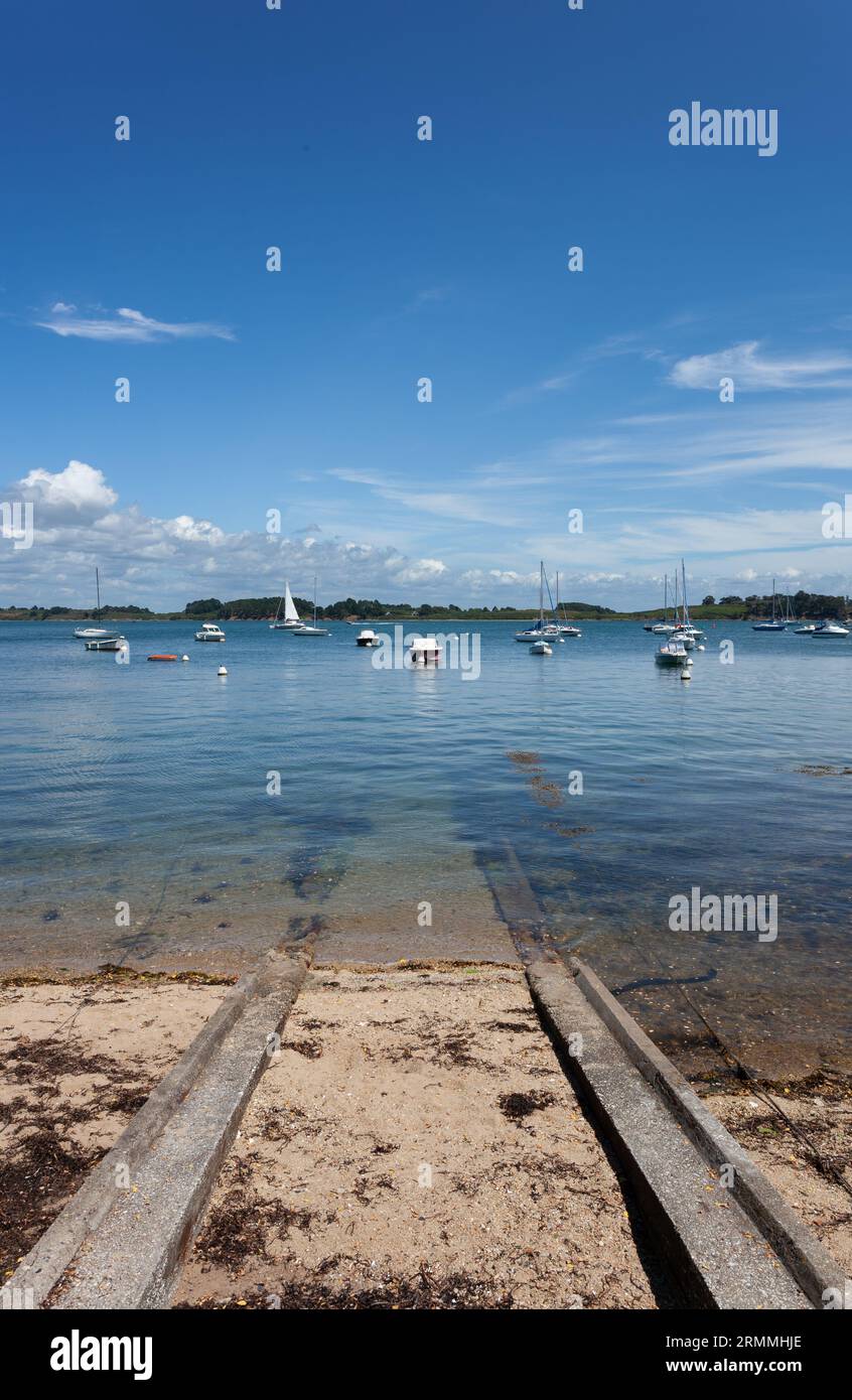 The rails guide the boats towards the ocean when launching Stock Photo ...