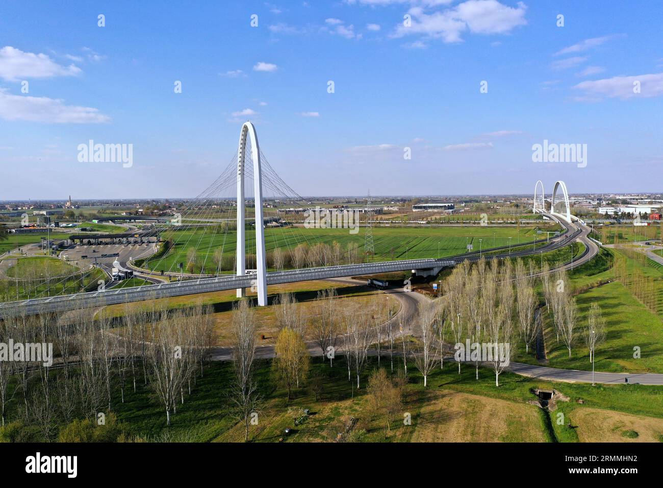 Aerial zenithal view of a roundabout with an arch of the suspension ...