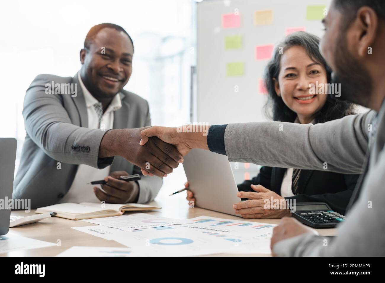 Multi ethnic business people diverse handshake, Successful businessmen ...