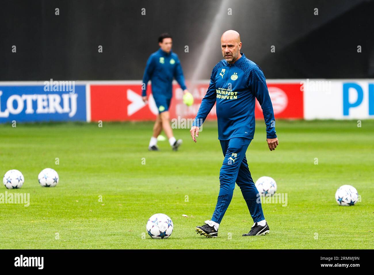 Football coach leading ball hi-res stock photography and images - Alamy