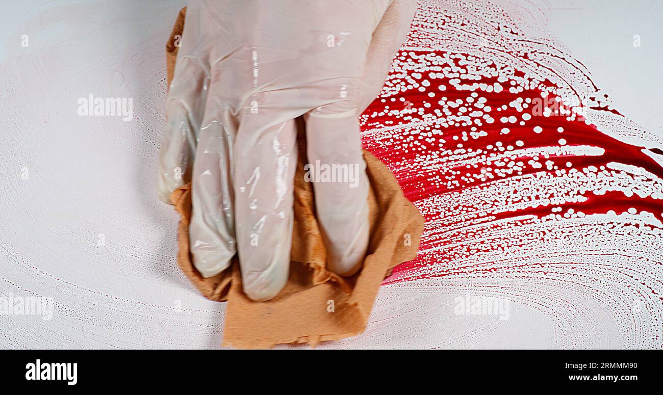 Gloved hand that wipes blood against White Background Stock Photo - Alamy