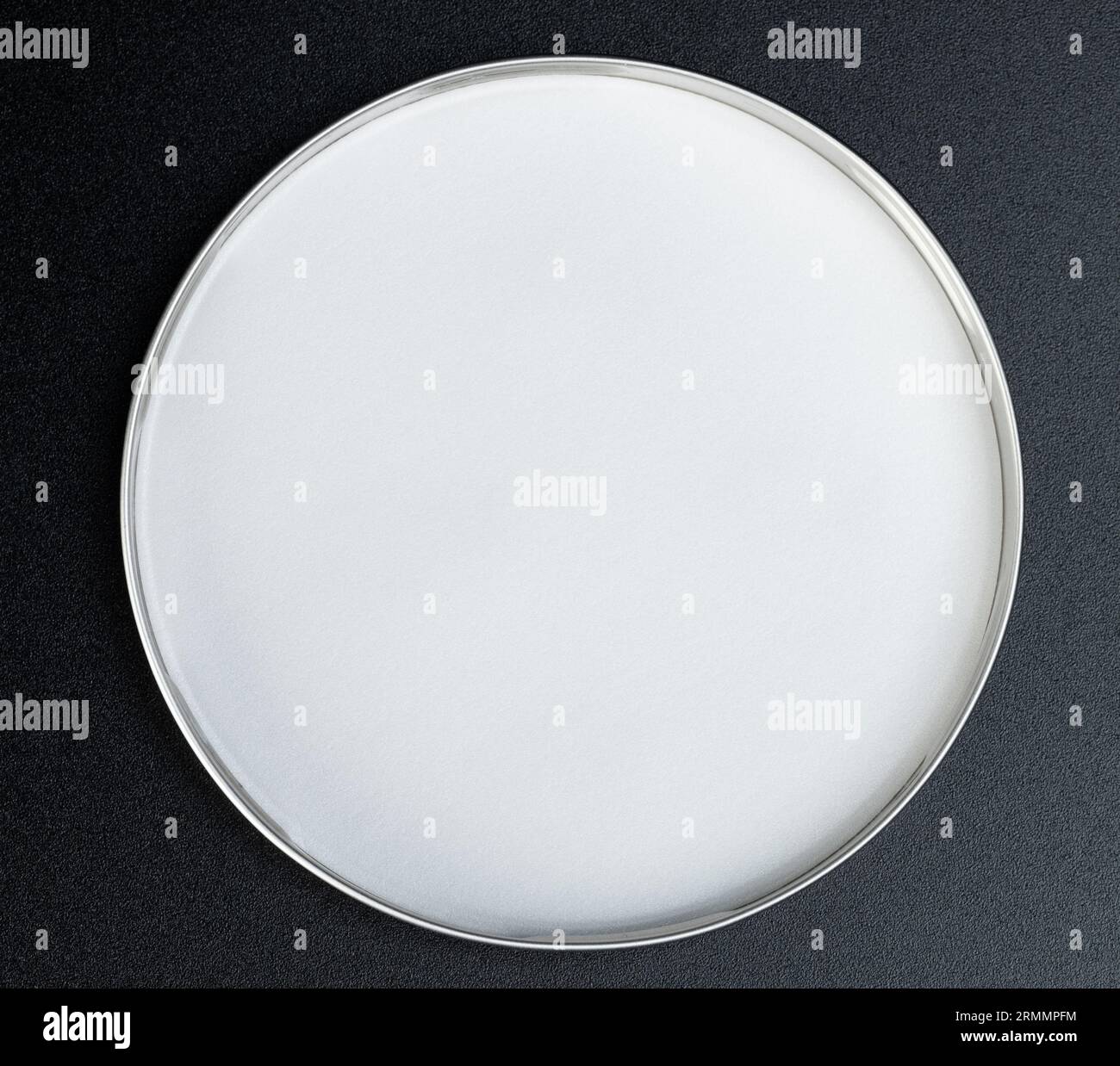 Round white cream lid cap above top view isolated Stock Photo - Alamy