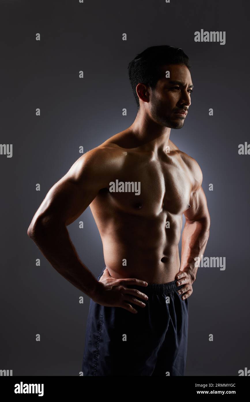 Muscle, dark studio and man with training challenge, workout and ...