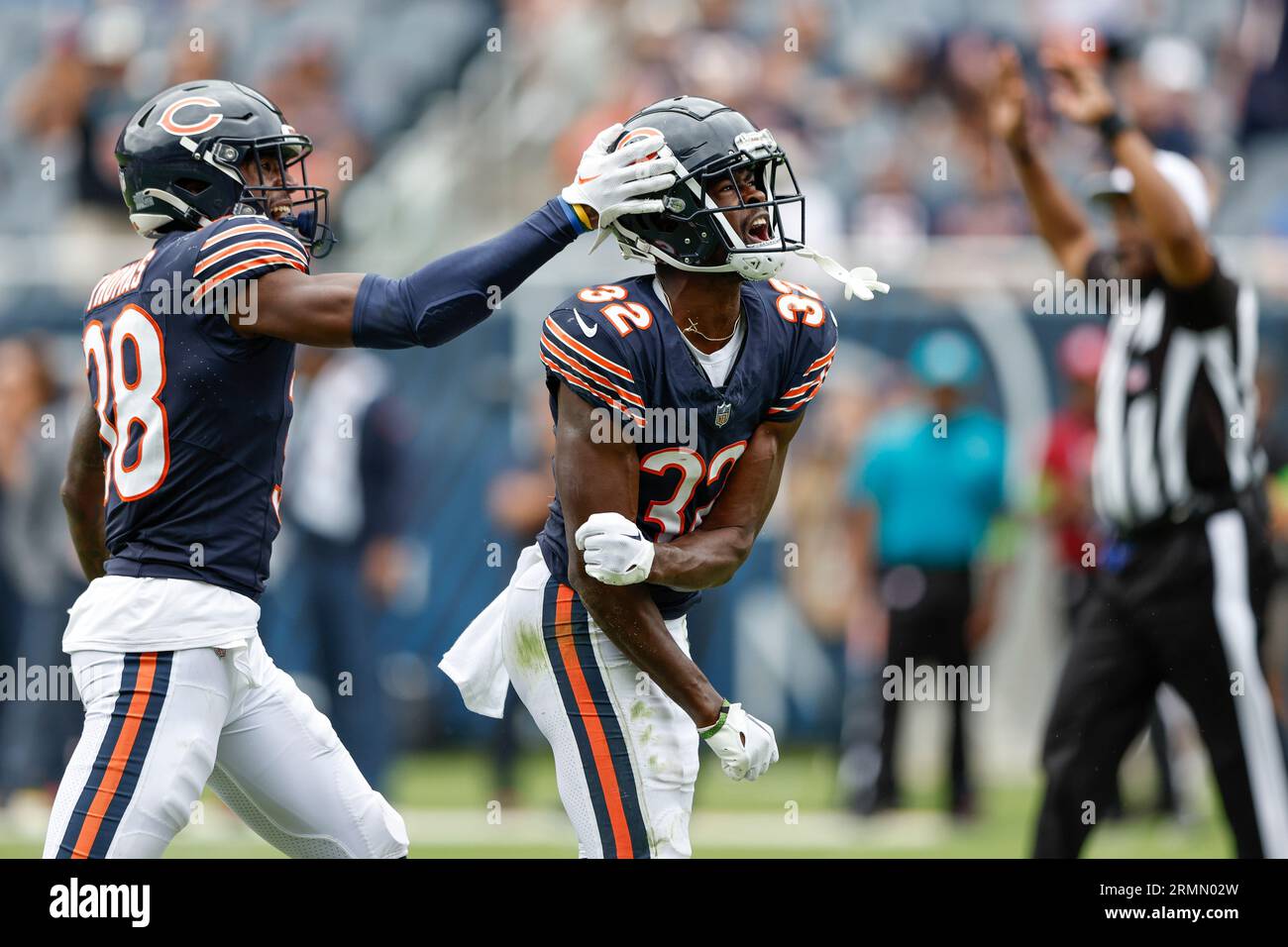 Chicago Bears wide receiver Isaiah Ford (32) and safety A.J. Thomas (38 ...