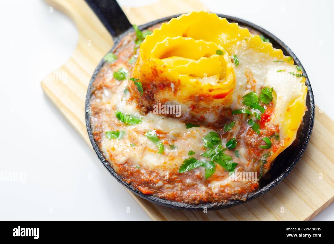 Hand rolled four cheese ravioli pasta in minced beef with Chianti red ...