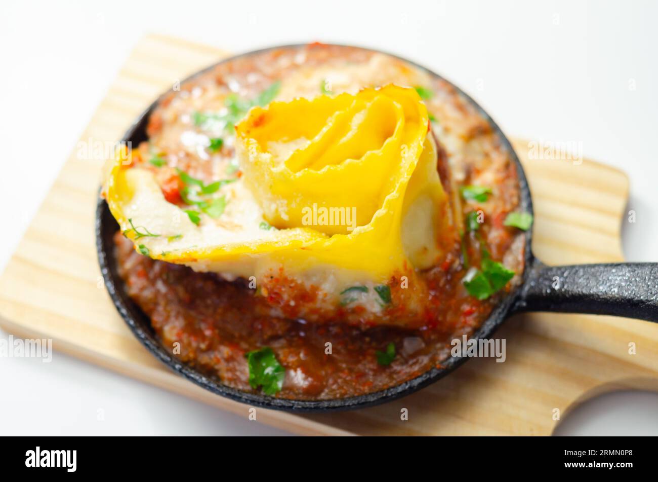 Hand rolled four cheese ravioli pasta in minced beef with Chianti red ...