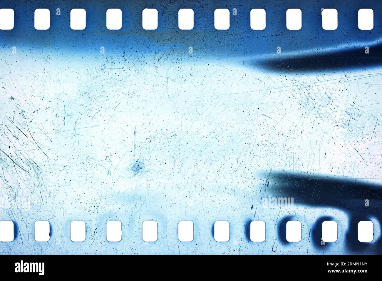 Dusty and grungy 35mm film texture or surface. Perforated scratched ...
