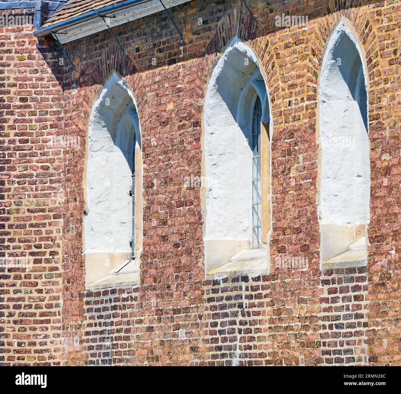 Trio of arched windows at Queens' College, University of Cambridge ...
