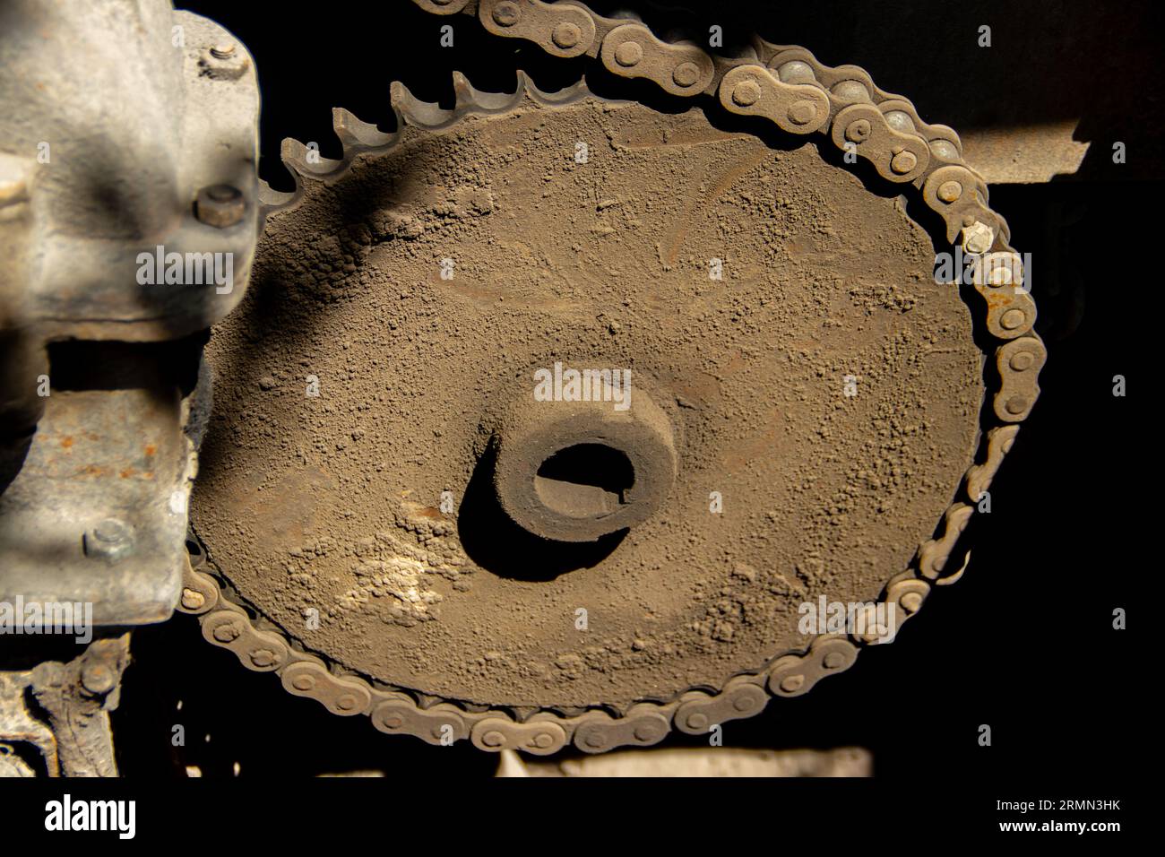 Rusty driving gears with metallic chain on a old mine train wagon for ...