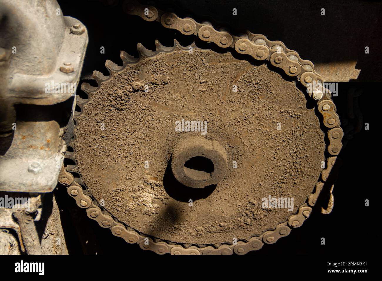 Rusty driving gears with metallic chain on a old mine train wagon for ...