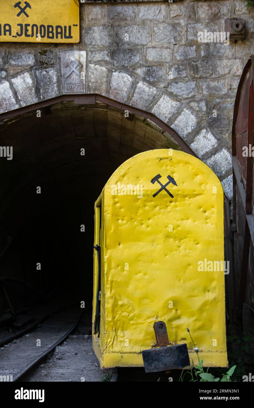 Entry gate to coal mine, leading deep into the earth. Mine shaft of the ...