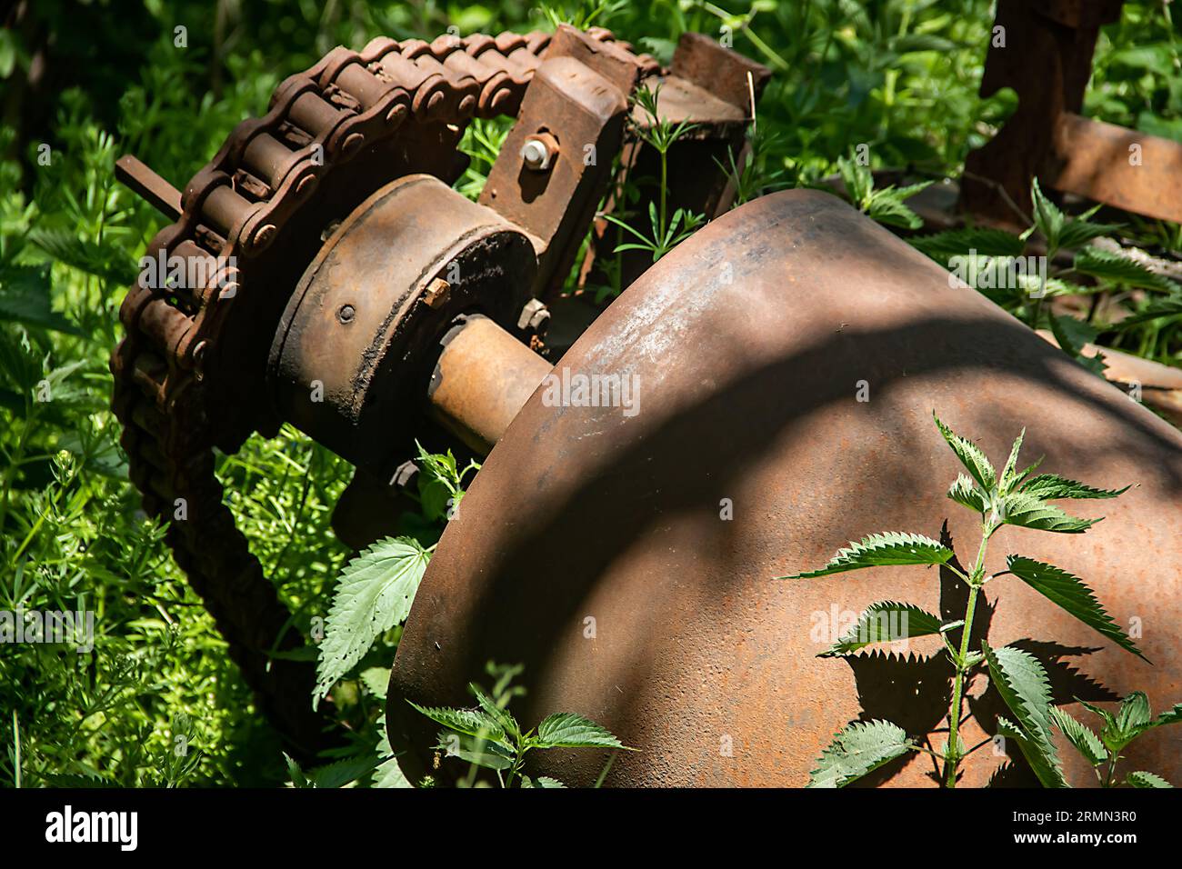 Rusty driving gears with metallic chain on a old mine train wagon for ...
