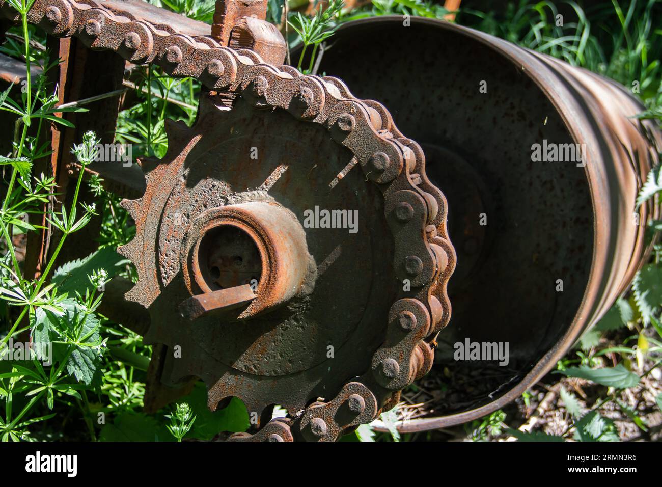 Rusty driving gears with metallic chain on a old mine train wagon for ...