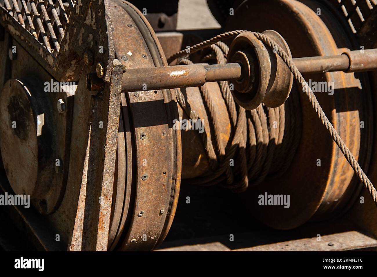 Rusty driving gears with metallic chain on a old mine train wagon for ...