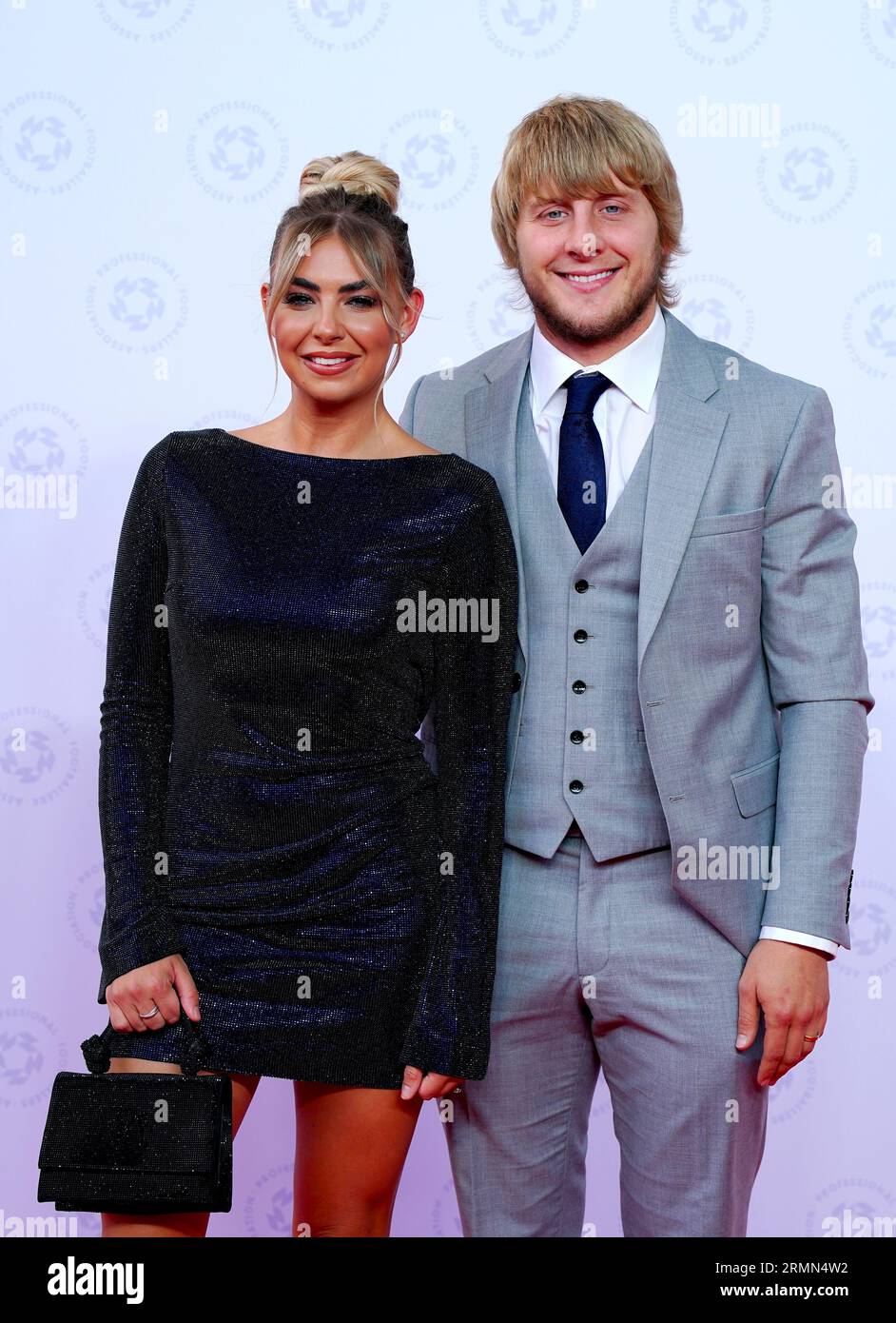 Paddy Pimblett (right) and Laura Pimblett arrive for the 2023 PFA ...