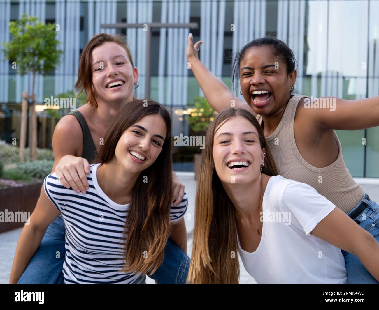 Group of girls friends teenager multiethnic students having fun in a ...