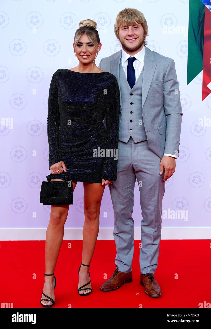 Paddy Pimblett (right) and Laura Pimblett arrive for the 2023 PFA ...