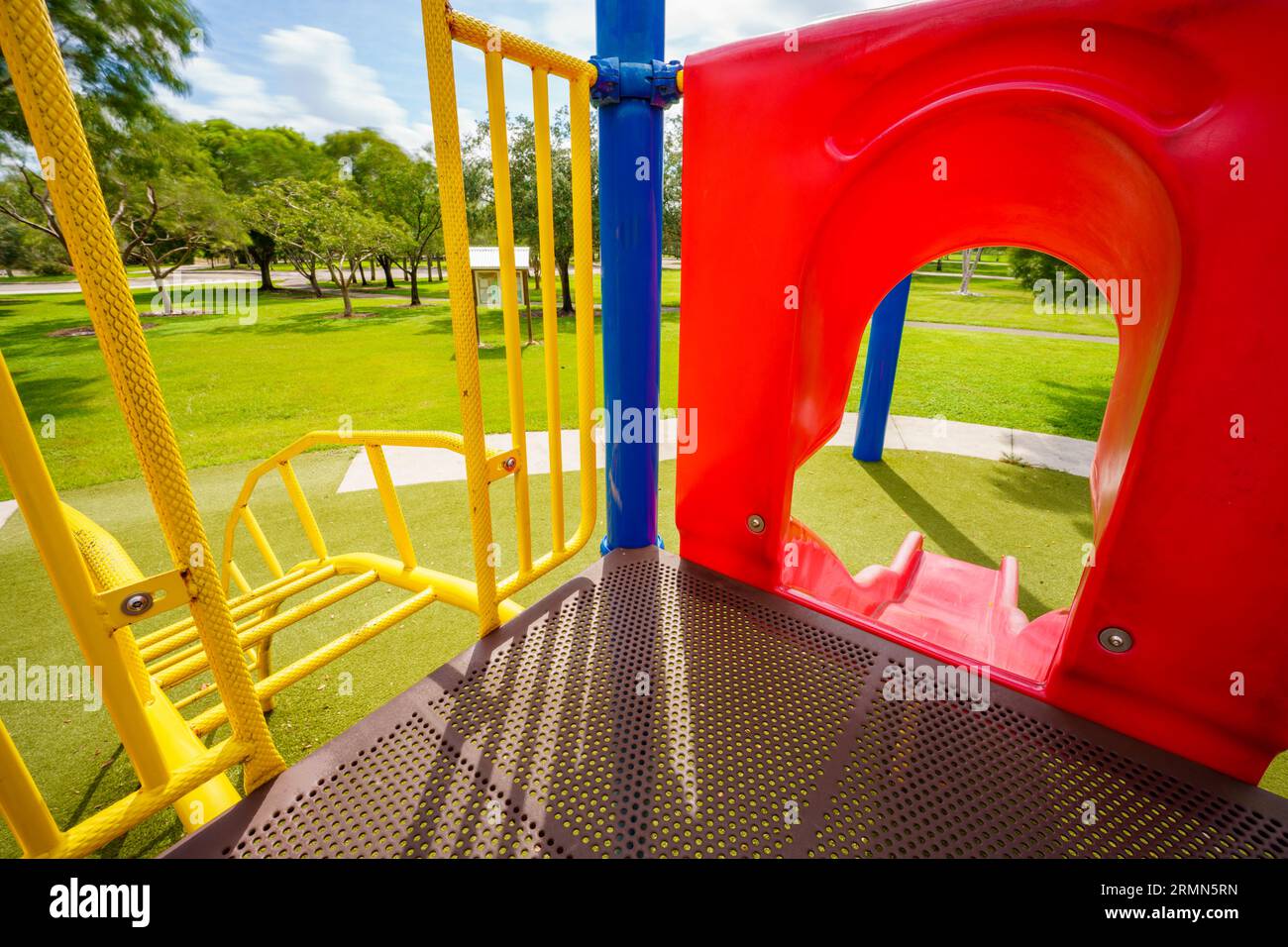 Childs choice between an easy slide or difficult stairs at the ...