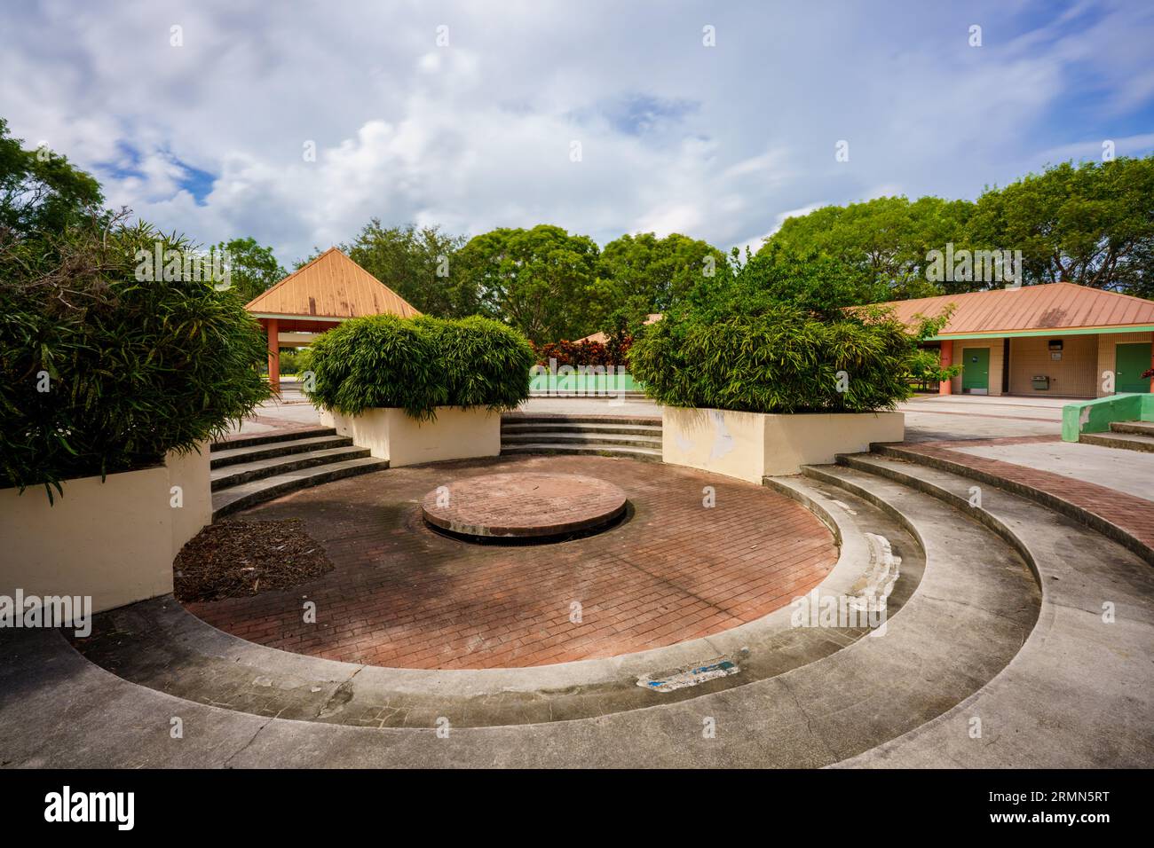 Old abandoned park with recessed seating area and stage Stock Photo - Alamy