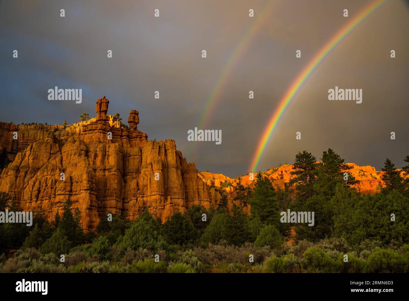 Brilliant double rainbows in Red Canyon area along Hwy 12. Utah, USA ...