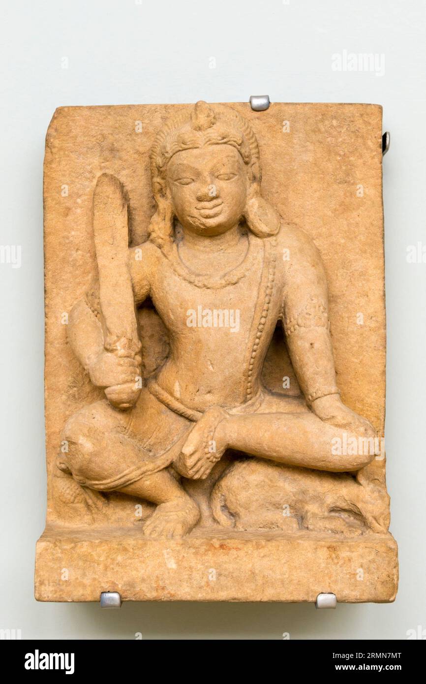 10th century red sandstone relief of Kuvera, the god of wealth. From ...