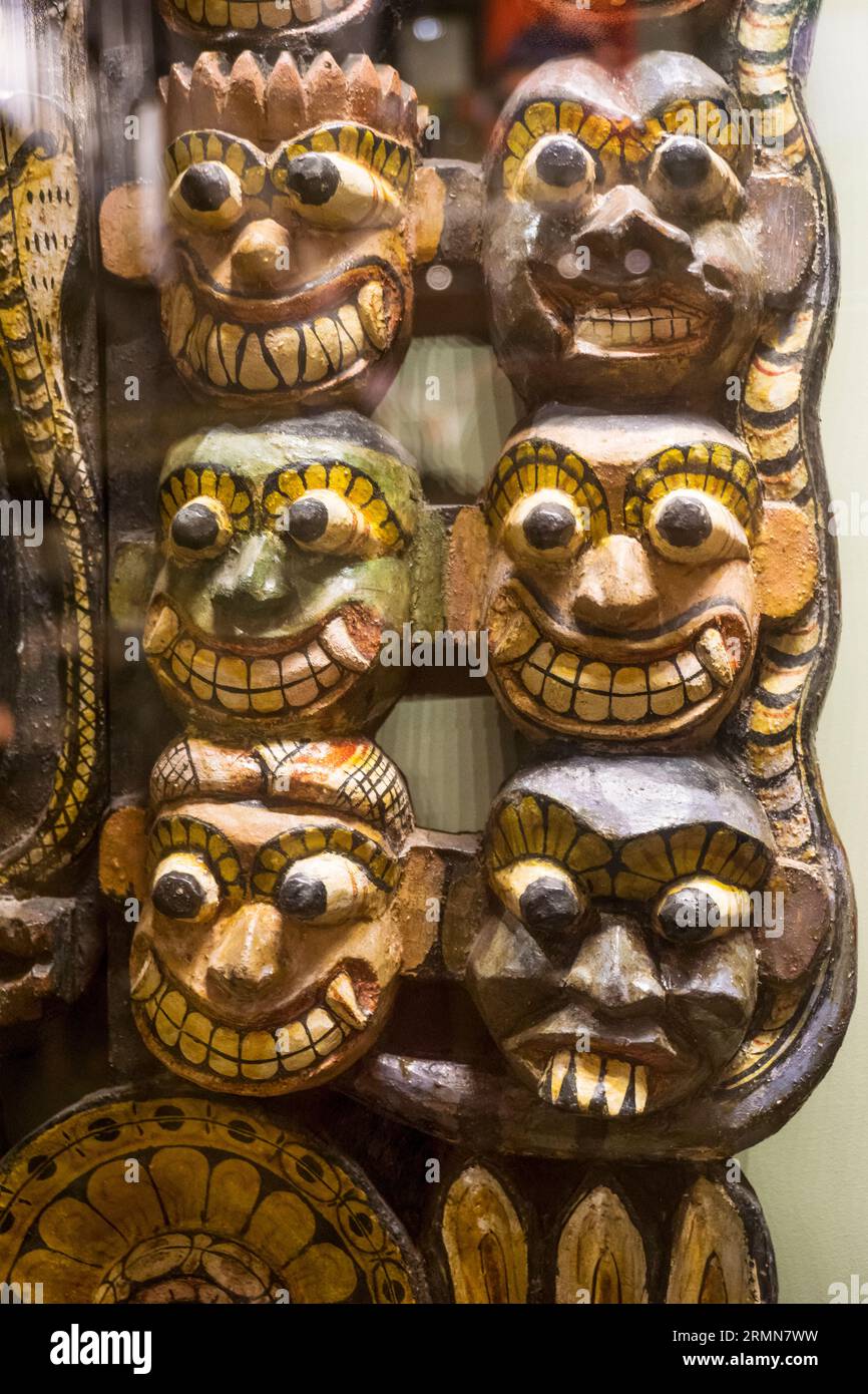 Mask of the 18 disease demons surrounding their master, Maha Kola Sanni ...