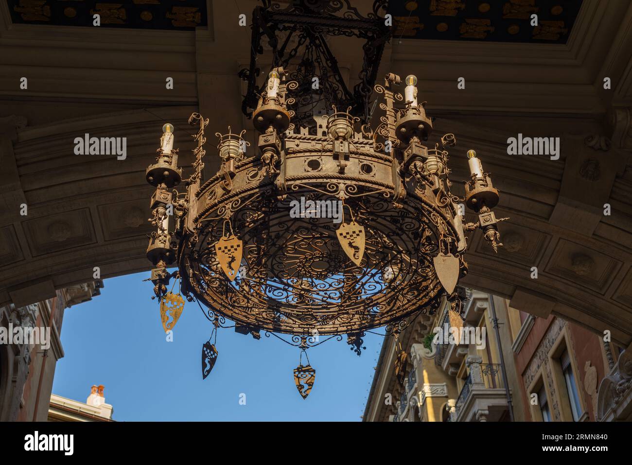 Wrought iron chandelier in the arch of the Palace of the Ambassadors ...