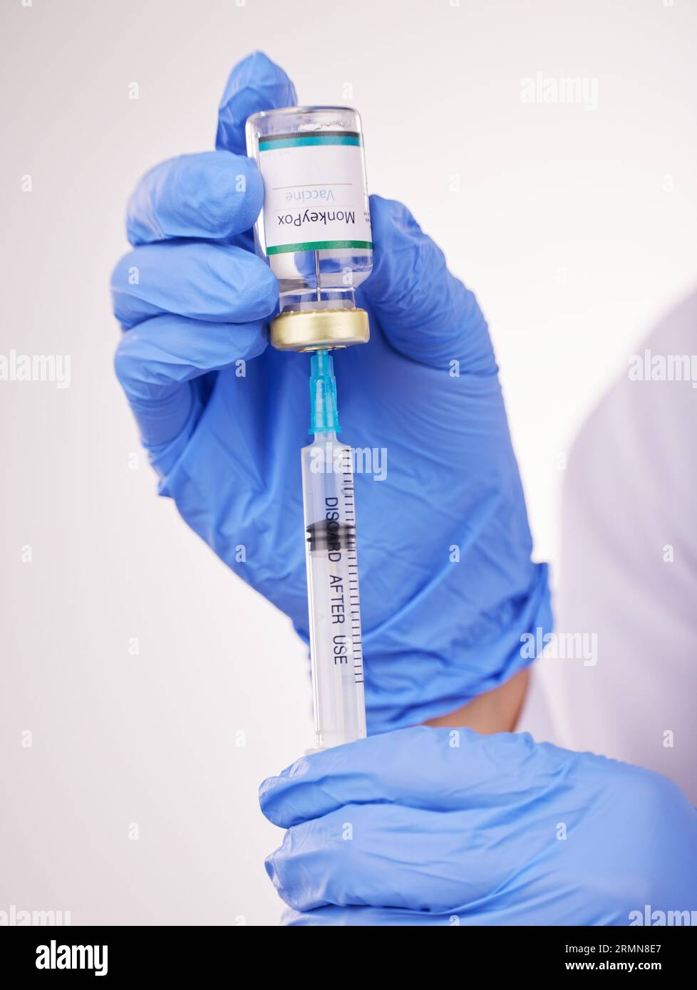 Health, doctor hands and vaccine, syringe and bottle with safety from ...