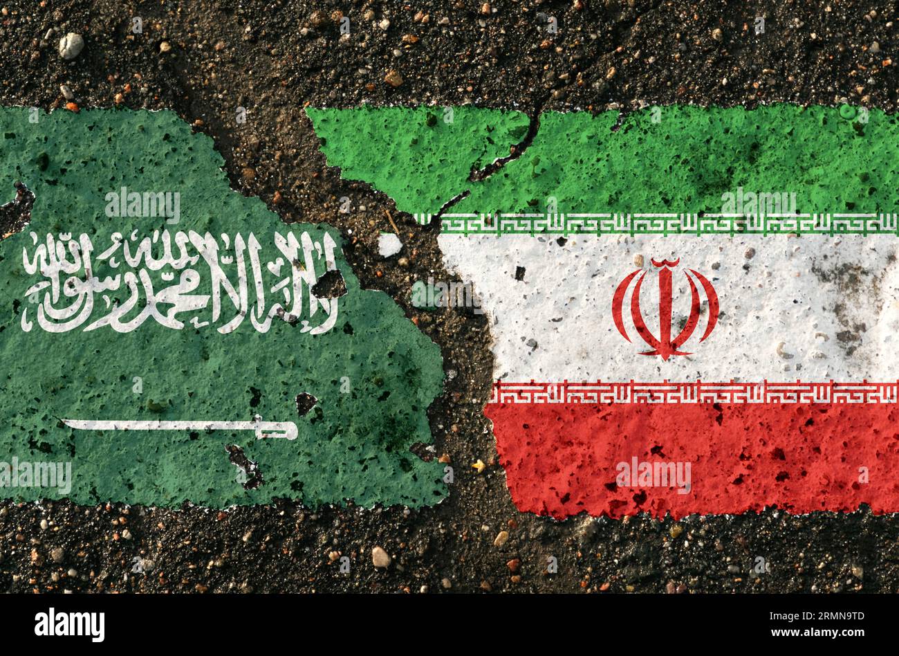 On the pavement there are images of the flags of Saudi Arabia and Iran ...