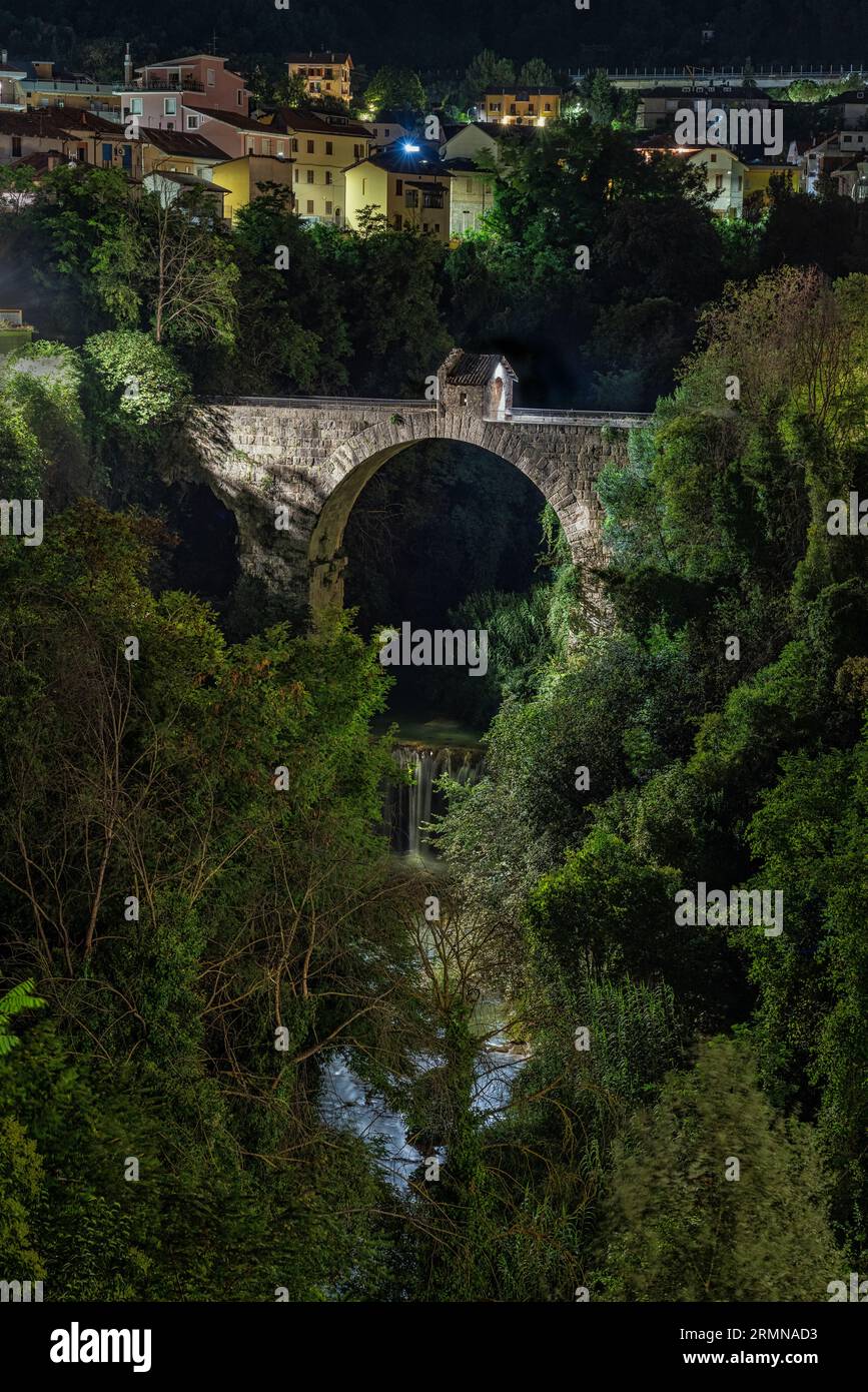 Night panorama of Cecco Bridge, also known as the Devil's Bridge, the ...