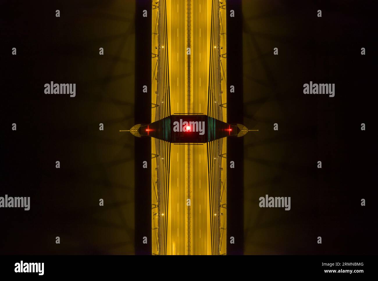 Top down view of the Megyeri bridge in Hungary at night. Drone view ...