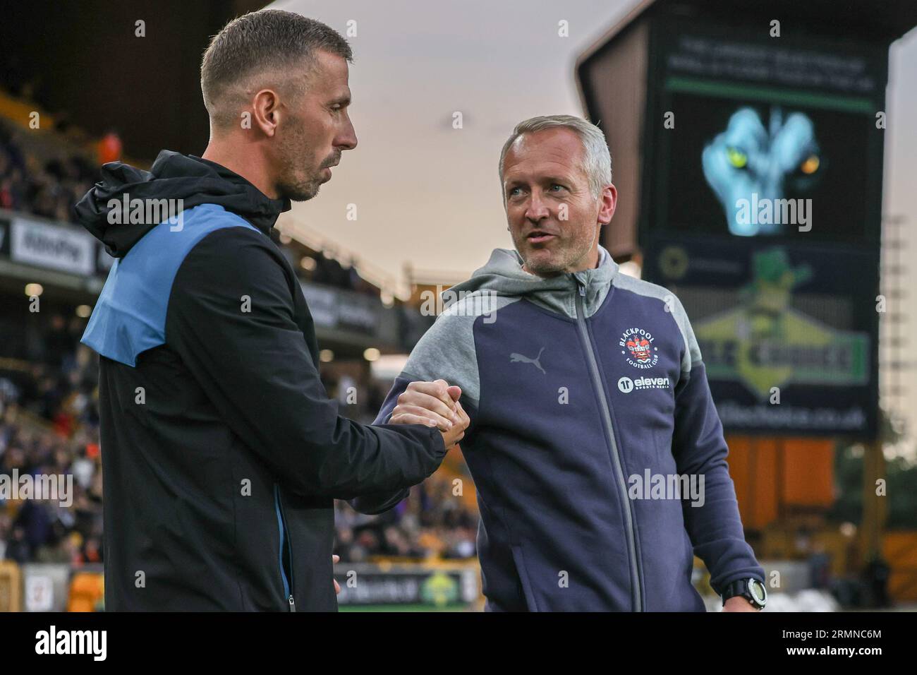Gary O'Neil of Wolverhampton Wanderers and Neil Critchley head coach of ...