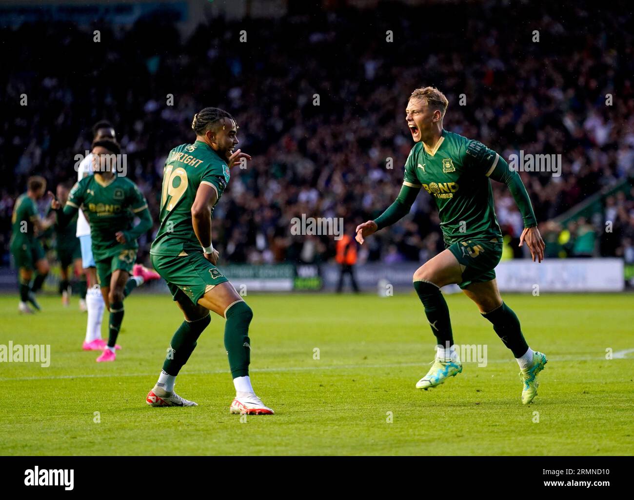 Plymouth Argyle's Ben Waine celebrates scoring their side's first goal ...