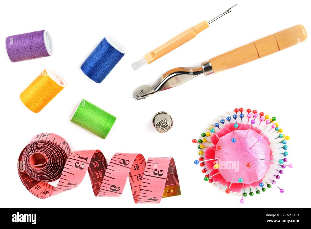 Composition with threads and sewing accessories isolated on white ...