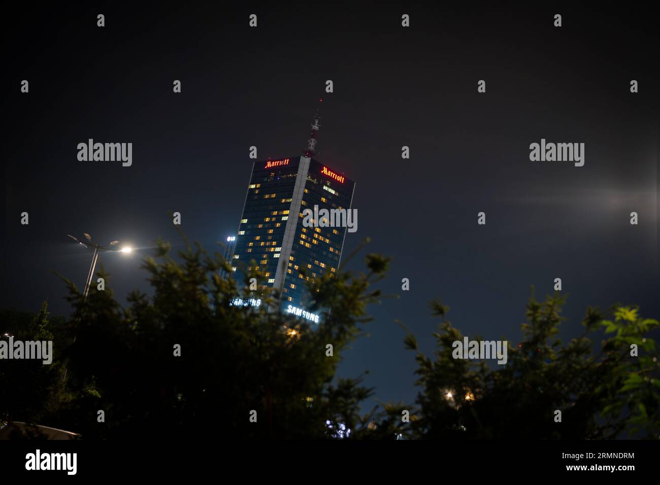 The Marriott hotel building is seen at night in Warsaw, Poland on 25 ...