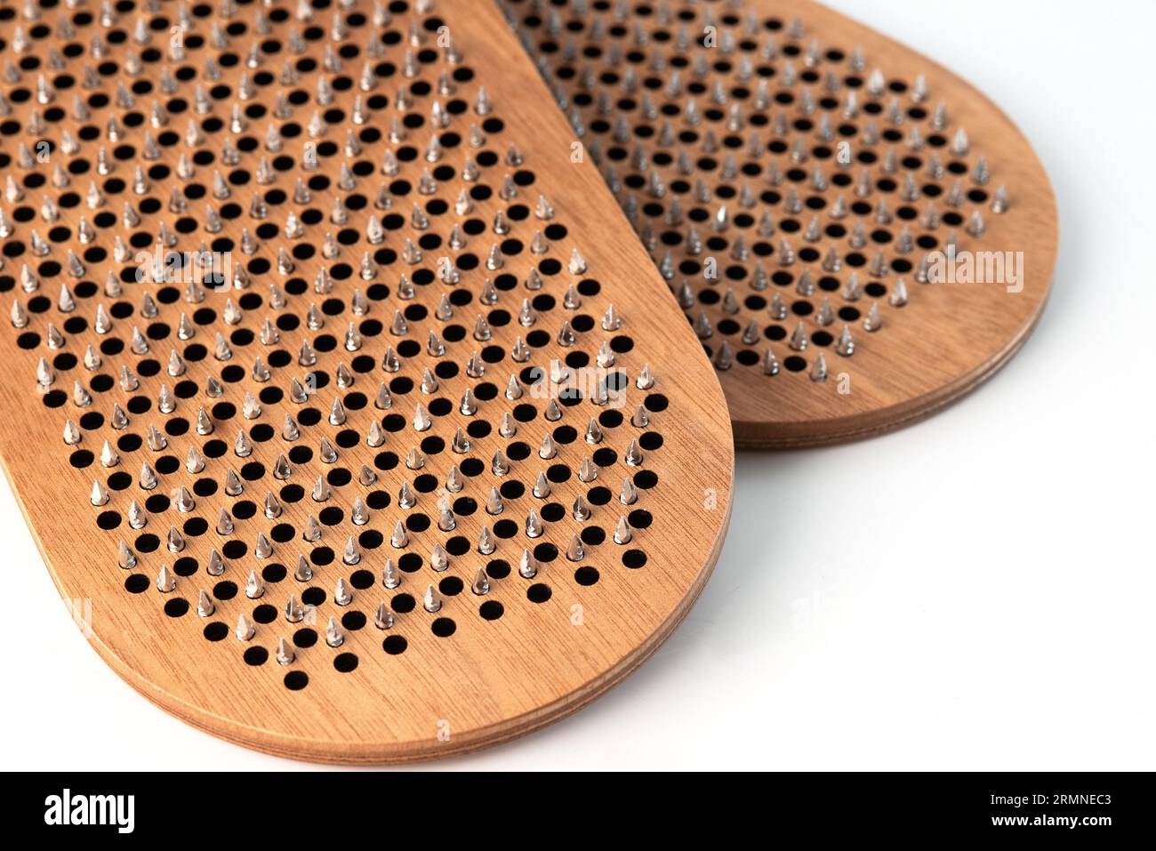 Sadhu board isolated on white background. The practice of standing on ...