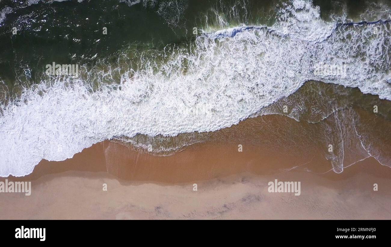 Aerial 4k above crashing waves hi-res stock photography and images - Alamy