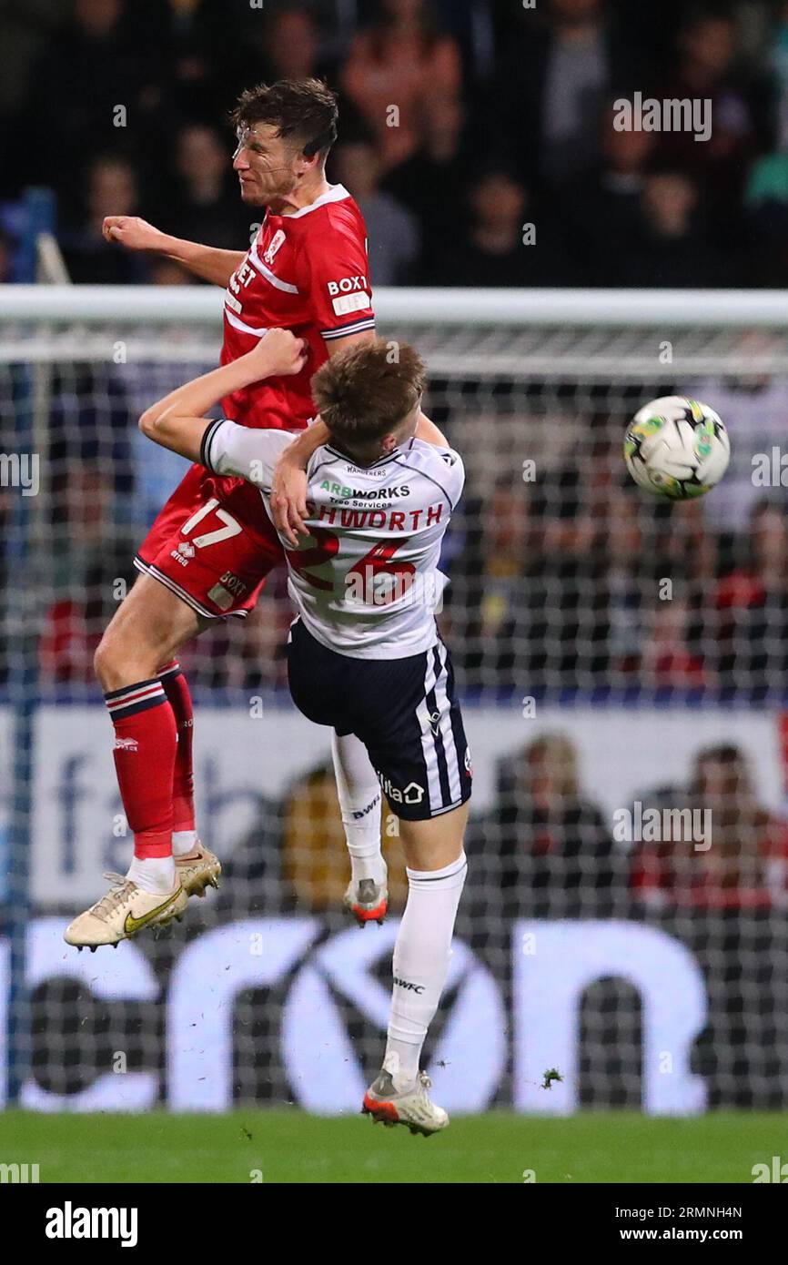 Bolton, UK. 26th Aug, 2023. Paddy McNair of Middlesbrough collides with ...
