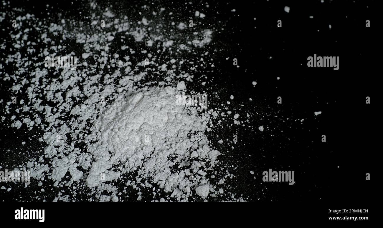Drug, Cocaine against black background Stock Photo - Alamy