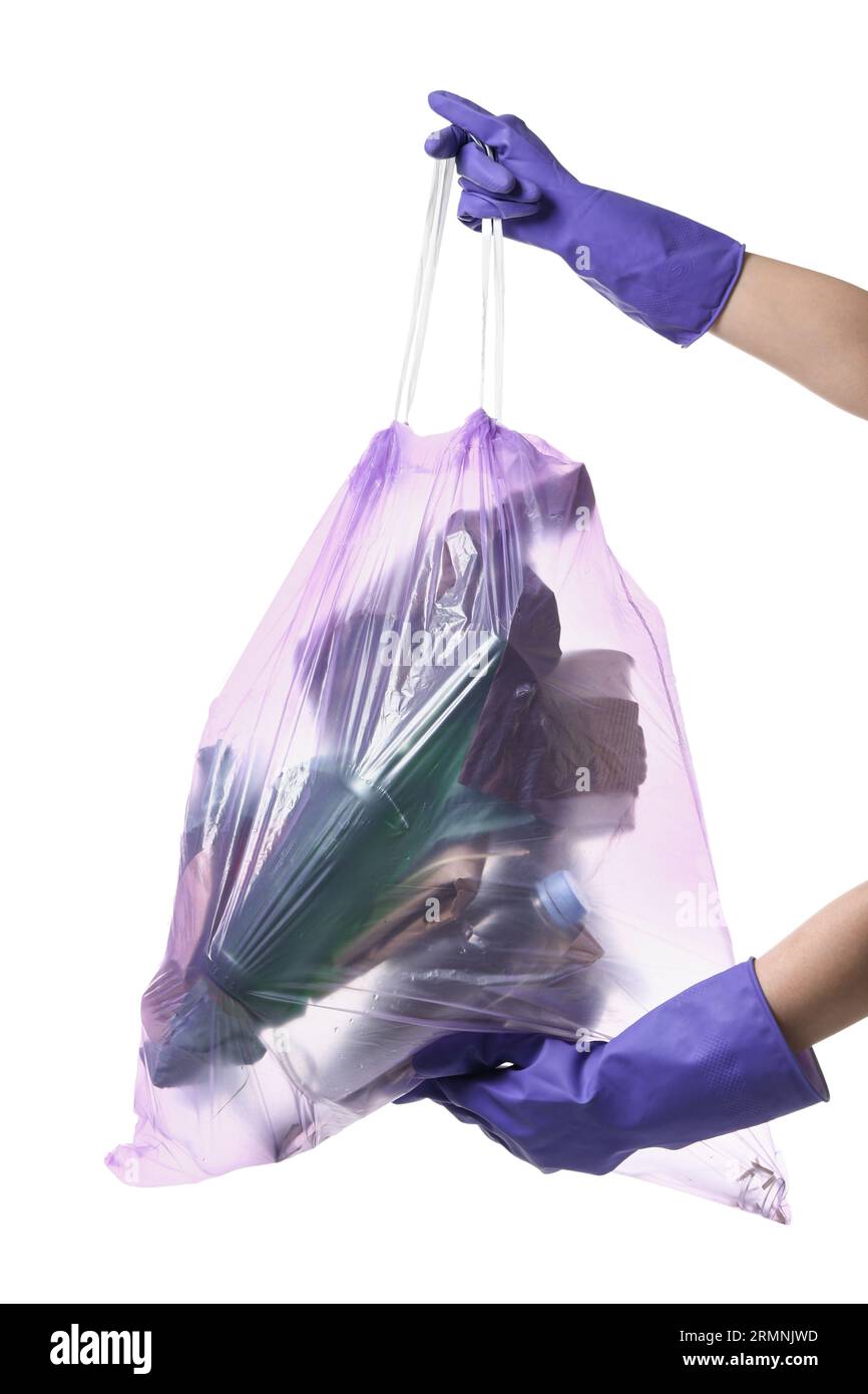 Female hands in rubber gloves holding full garbage bag isolated on ...