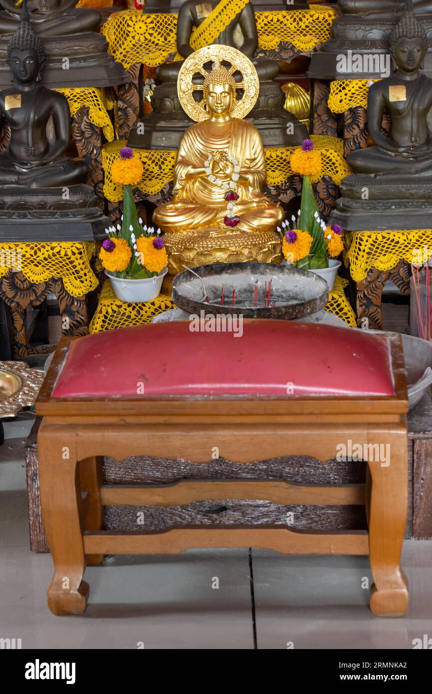 Interior with an altar in a Buddhist temple Wat Iam Pracha Mit, Samut ...