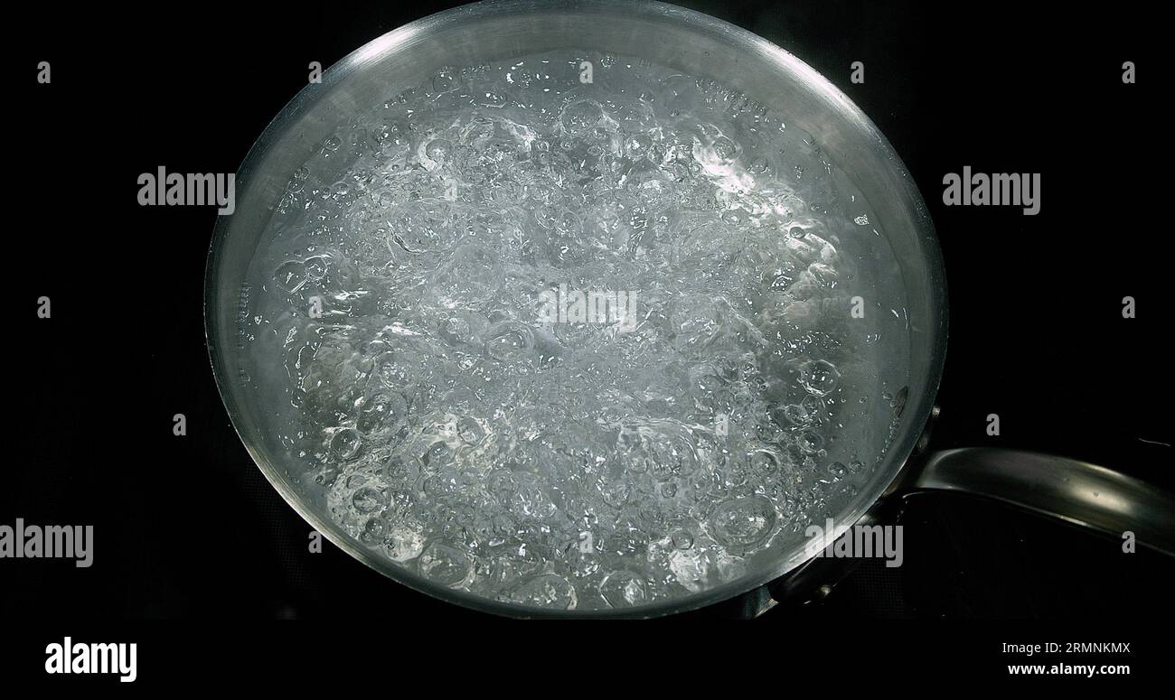Hot Boiling Water in a saucepan Stock Photo - Alamy