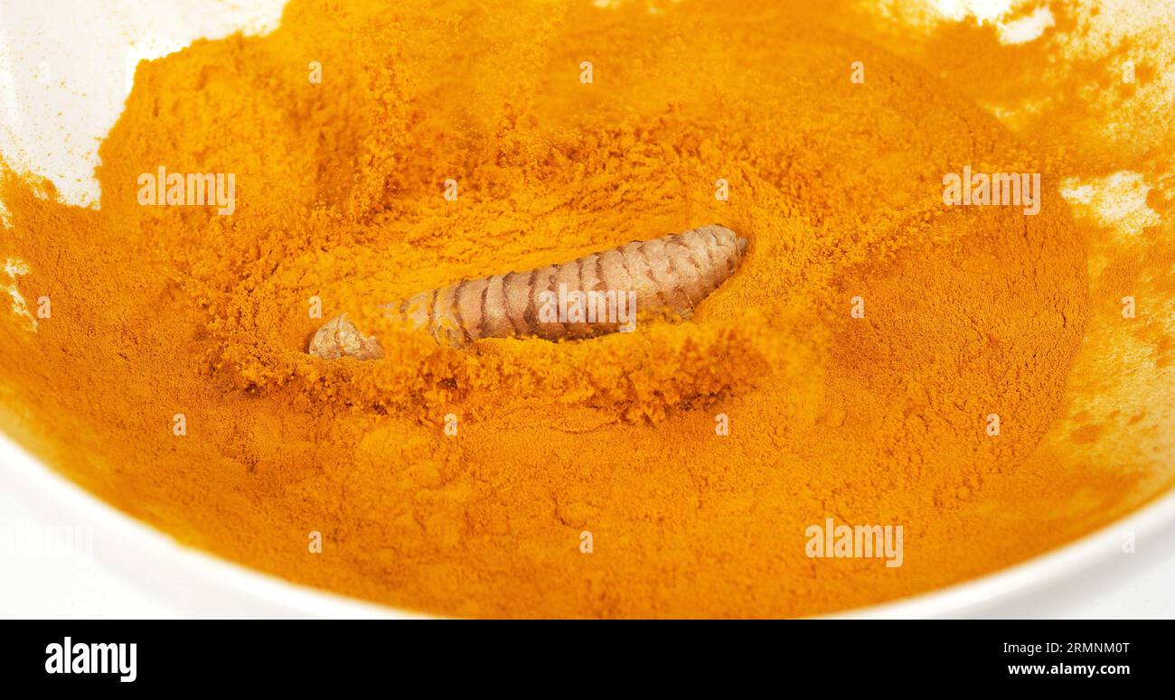 Turmeric, curcuma longa, Root falling on curcuma Powder, Indian Spice ...