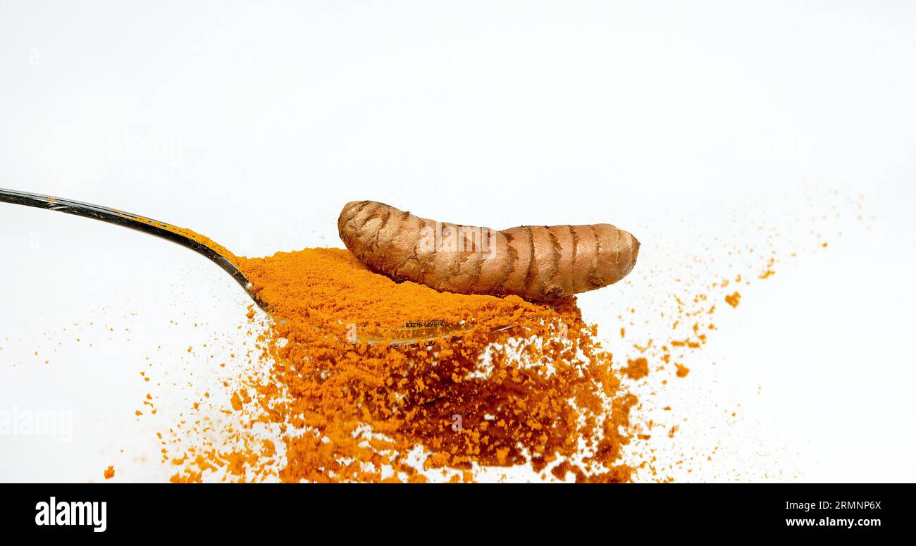 Turmeric, curcuma longa, Root falling on curcuma Powder, Indian Spice ...