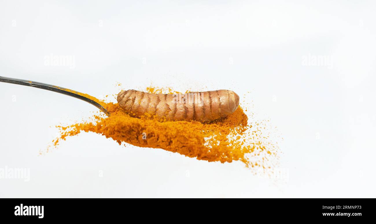 Turmeric, curcuma longa, Root falling on curcuma Powder, Indian Spice ...