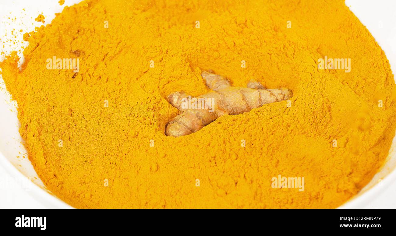 Turmeric, curcuma longa, Root falling on curcuma Powder, Indian Spice ...