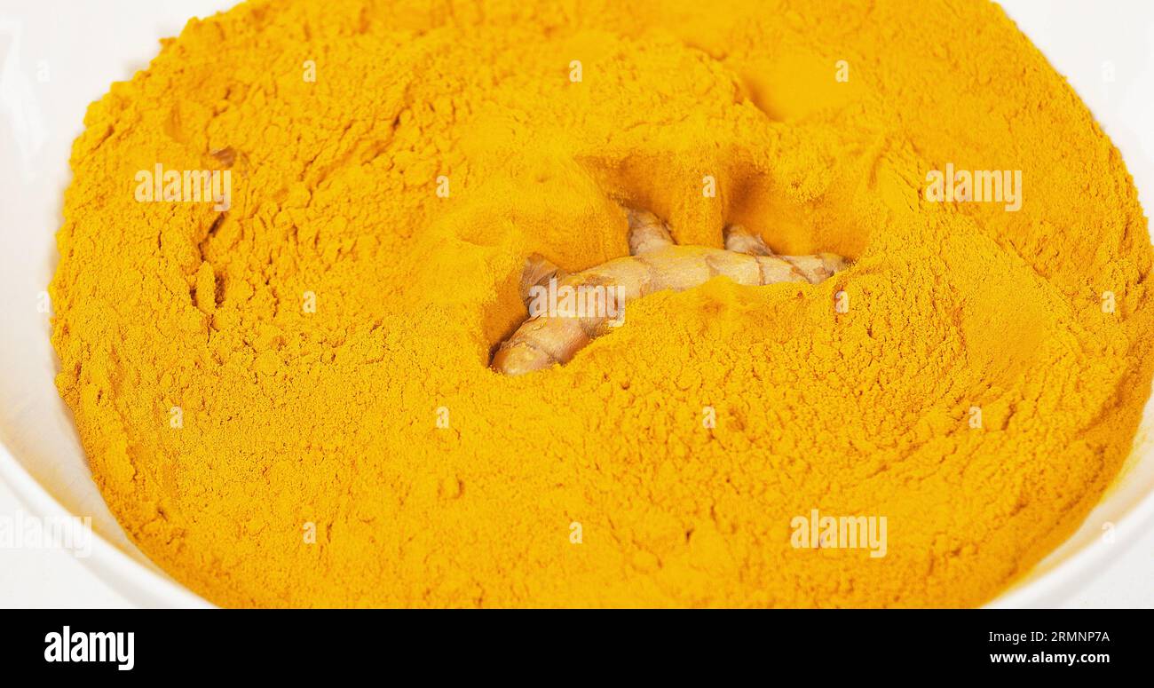 Turmeric, curcuma longa, Root falling on curcuma Powder, Indian Spice ...