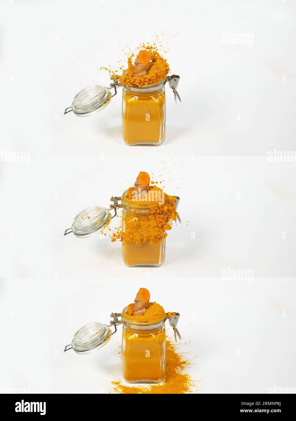 Turmeric, curcuma longa, Powder in a small Jar against White Background ...