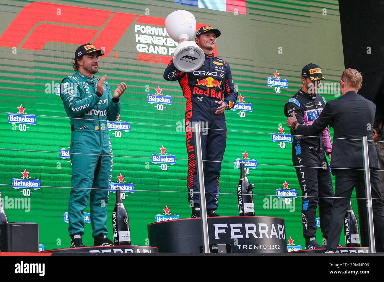 Max Verstappen 1 (NED), HONDA Red Bull Racing RB19 lifts the trophy on ...